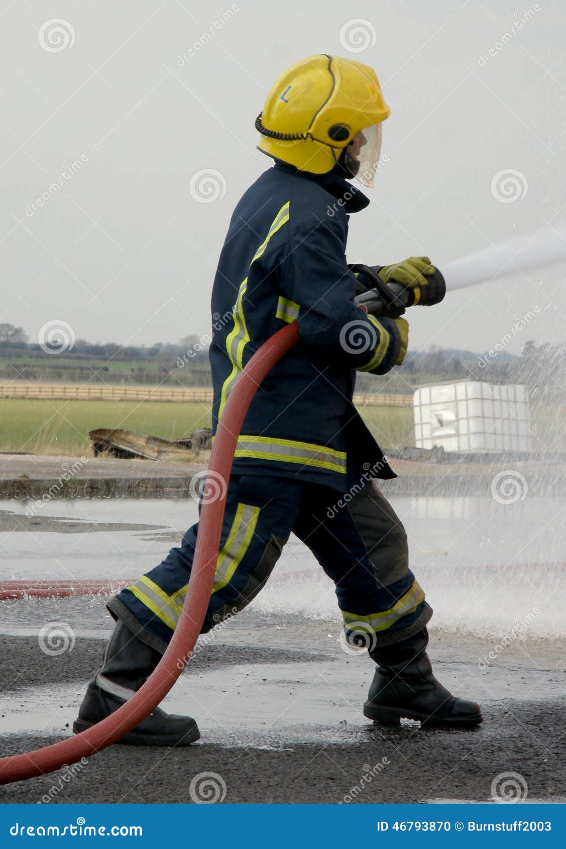 Fire-fighter with hose editorial image. Image of heat - 46793870