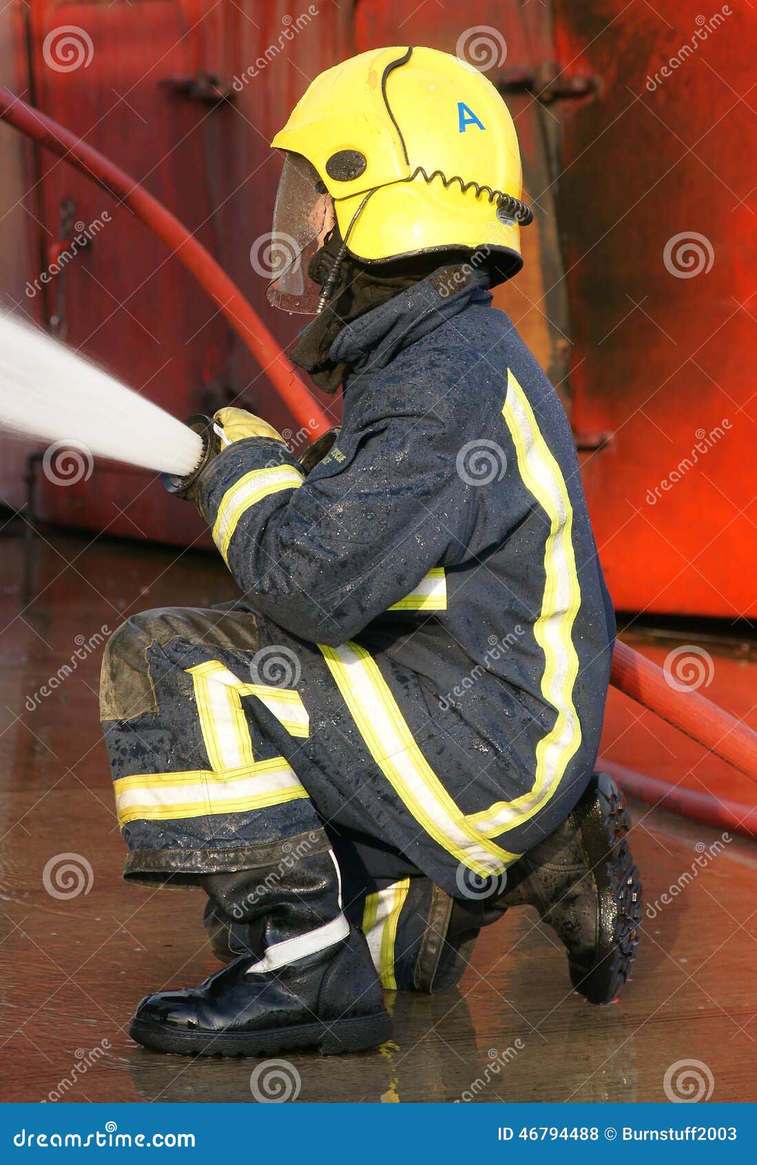 Fire fighter with hose editorial stock photo. Image of protection ...