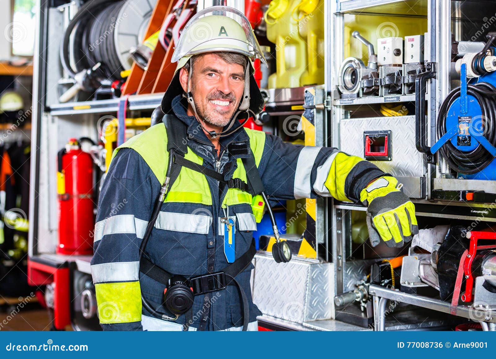 Fire Fighter in Protective Clothes Leaning at Fire Engine Stock Photo ...