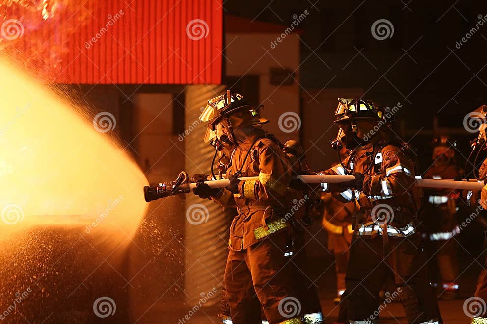 Fire Fighters stock image. Image of firesuits, reflective - 2348863