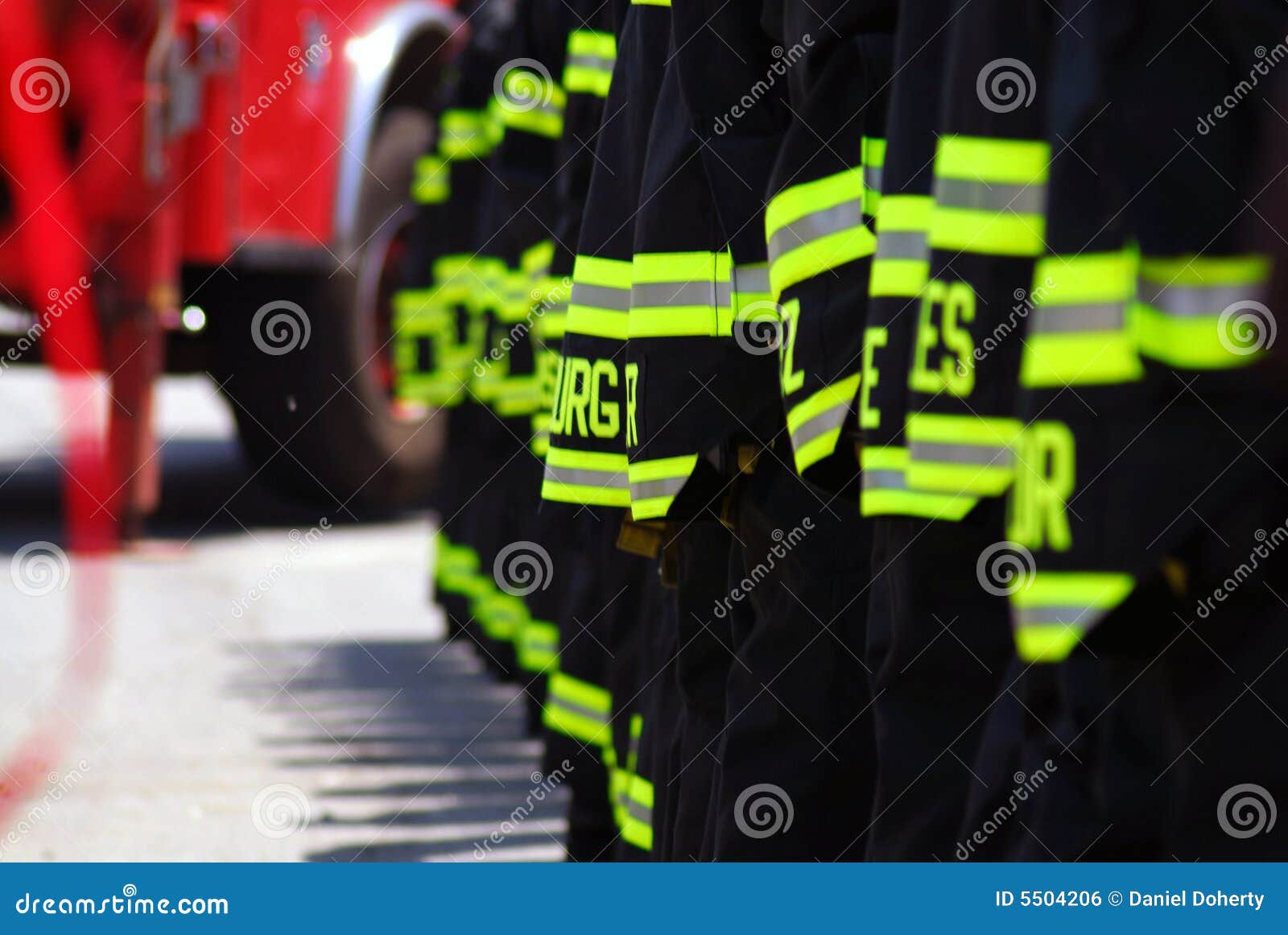 Fire Fighters in a Line stock photo. Image of disasters - 5504206