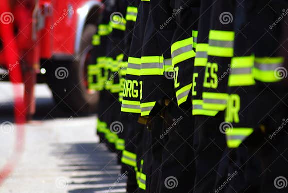 Fire Fighters in a Line stock photo. Image of disasters - 5504206