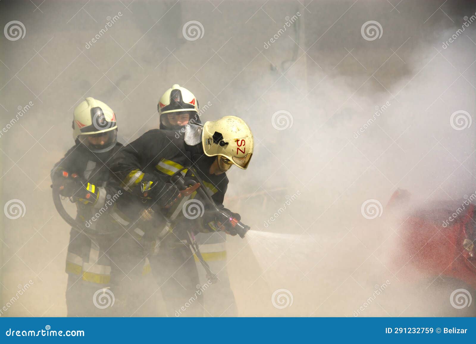 Fire-fighting of a Broken Car in a Fireman Show Editorial Stock Image ...