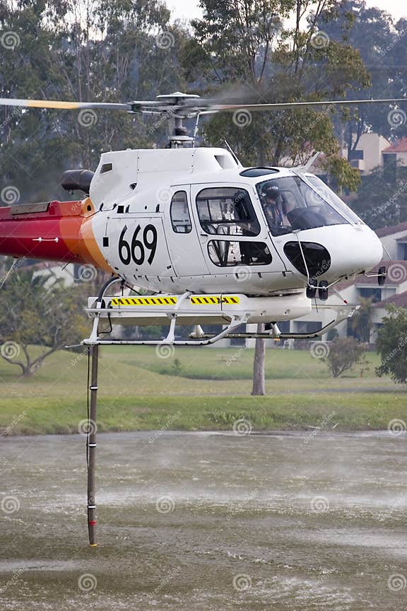 Fire fighting chopper 3 stock image. Image of houses, fighting - 1423085