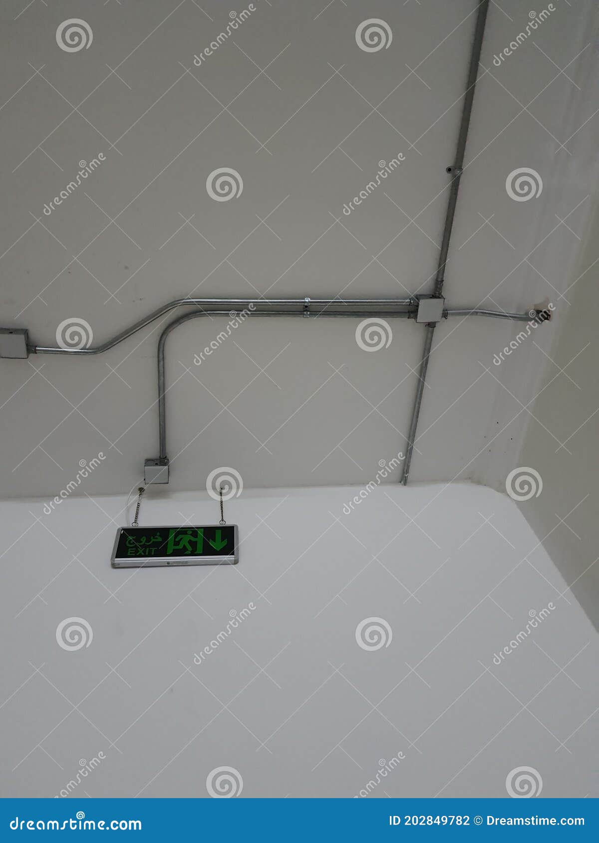 Fire Fighting Network and Emergency Exit Signs Stock Photo - Image of ...