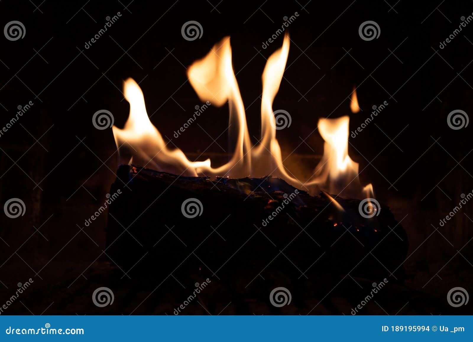 Fire in fireplace figures stock photo. Image of flammable - 189195994