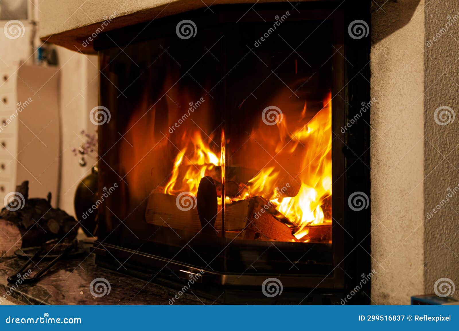 Fire in a Fireplace in the Living Room with Accessories Stock Image ...