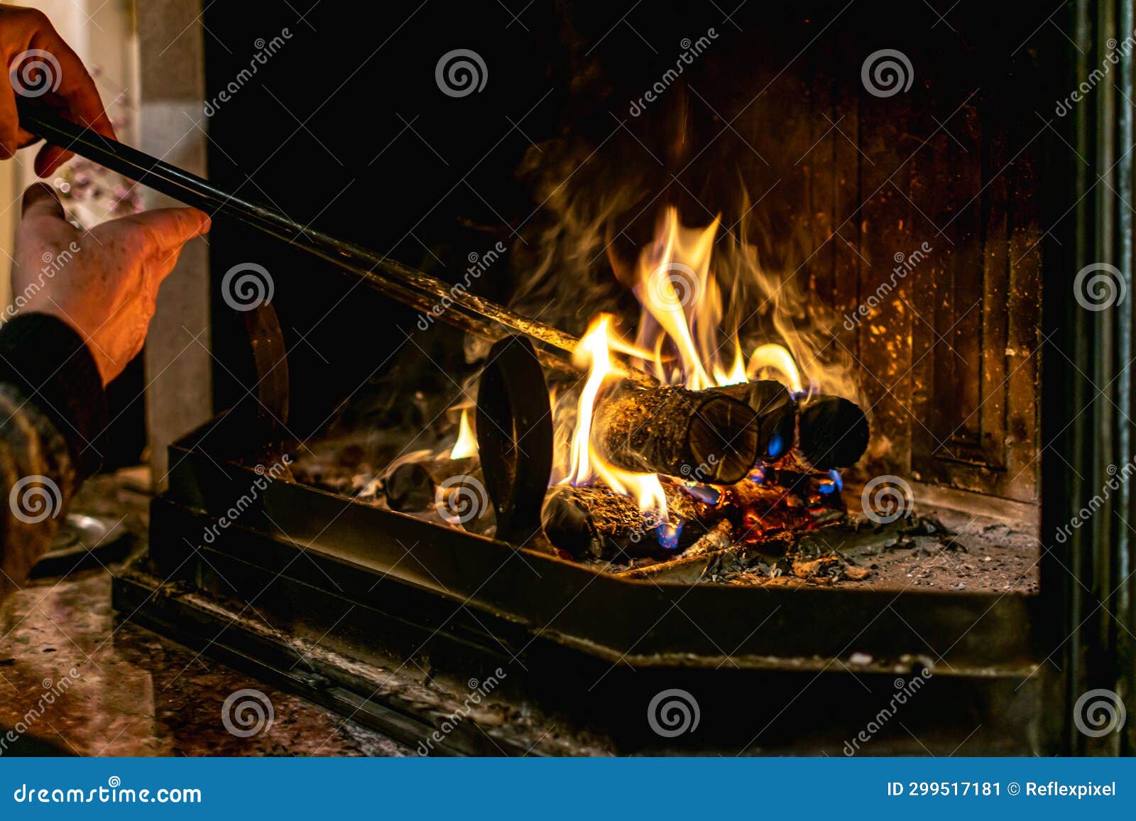 Fire in a Fireplace in the Living Room with Accessories Stock Image ...