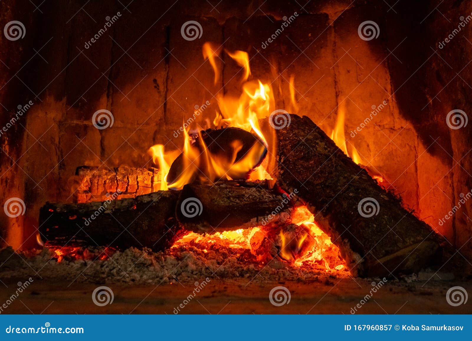Fire in a Fireplace with Logs and Flames Creating a Sense of Warmth and ...
