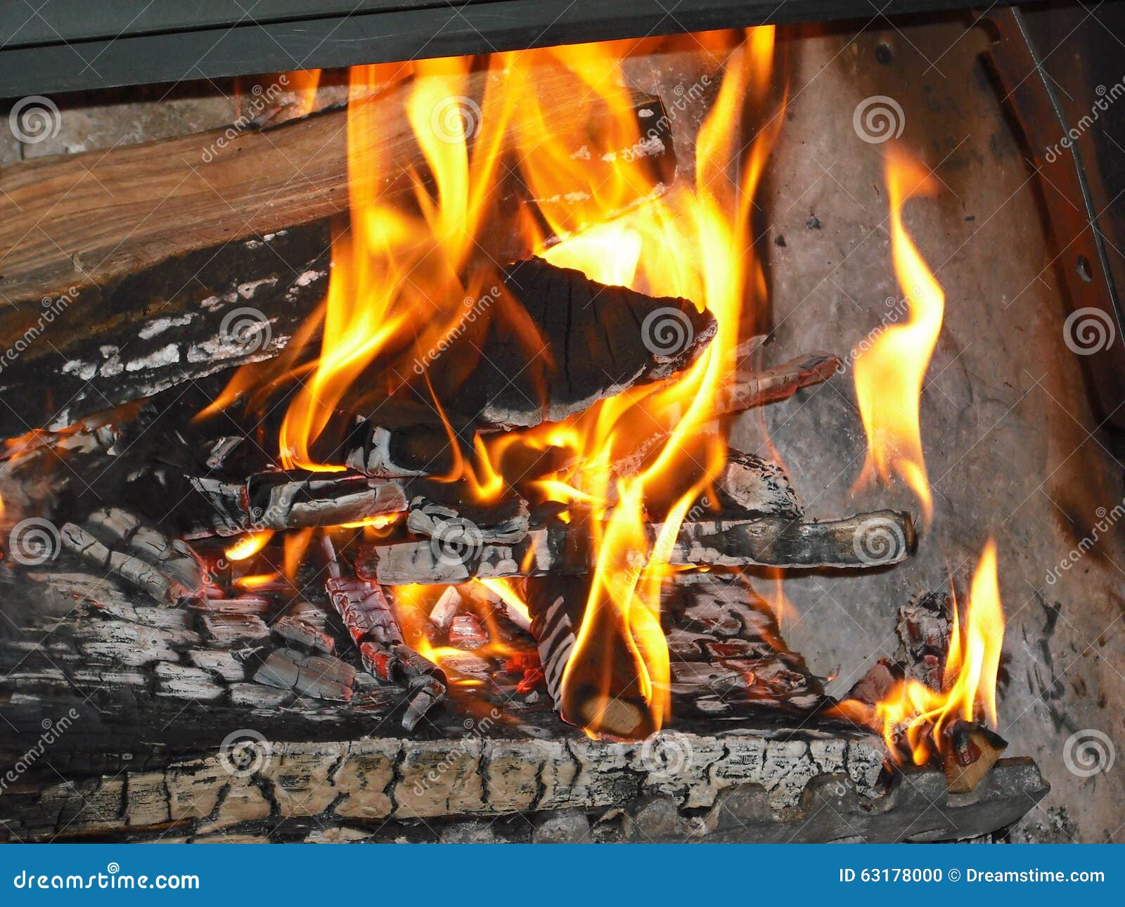 Fire on a fireplace stock photo. Image of ember, house - 63178000