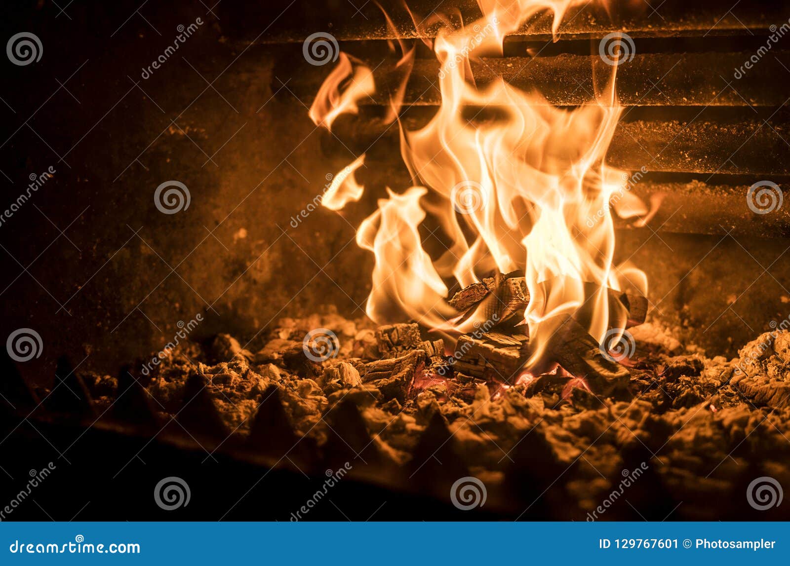 Warm fire in the fireplace stock image. Image of modern - 129767601