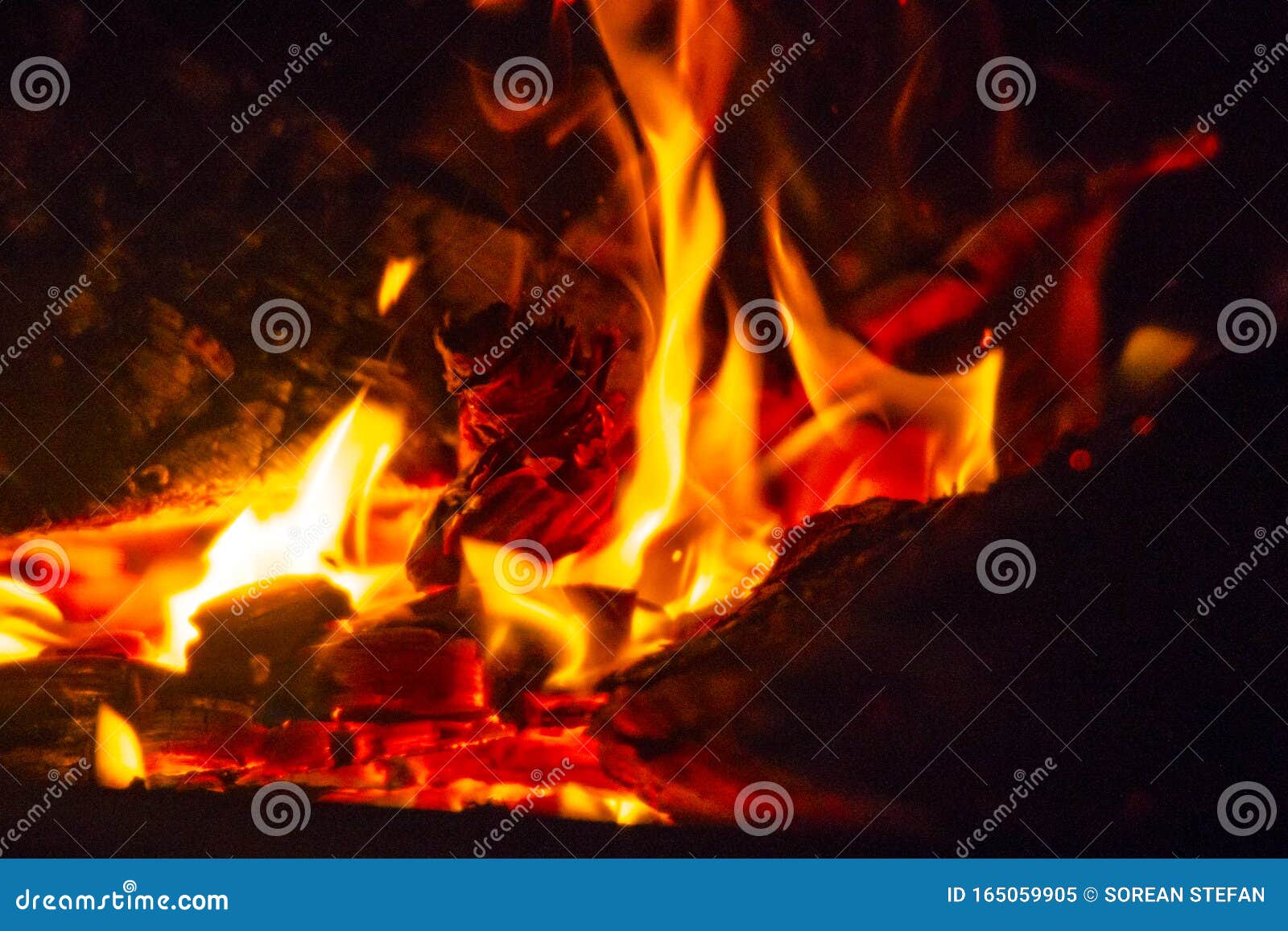 Fire flame in the chimney stock image. Image of burn - 165059905