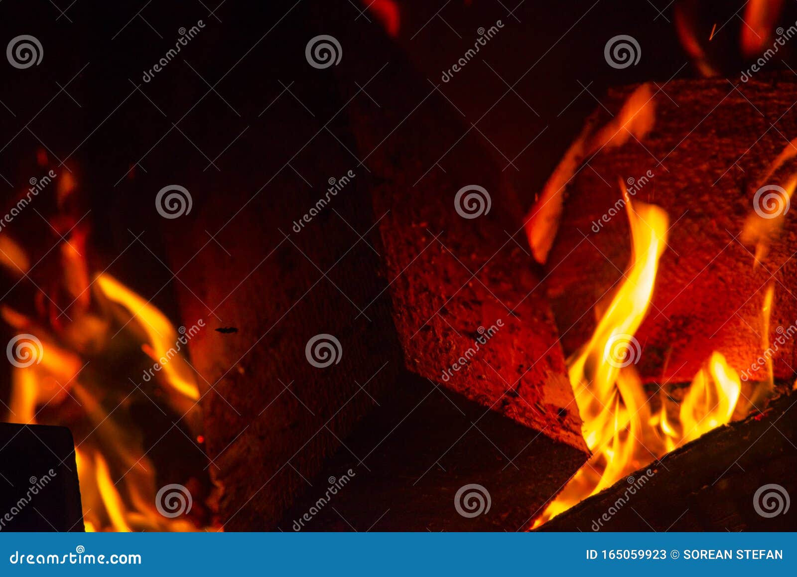 Fire flame in the chimney stock image. Image of holiday - 165059923