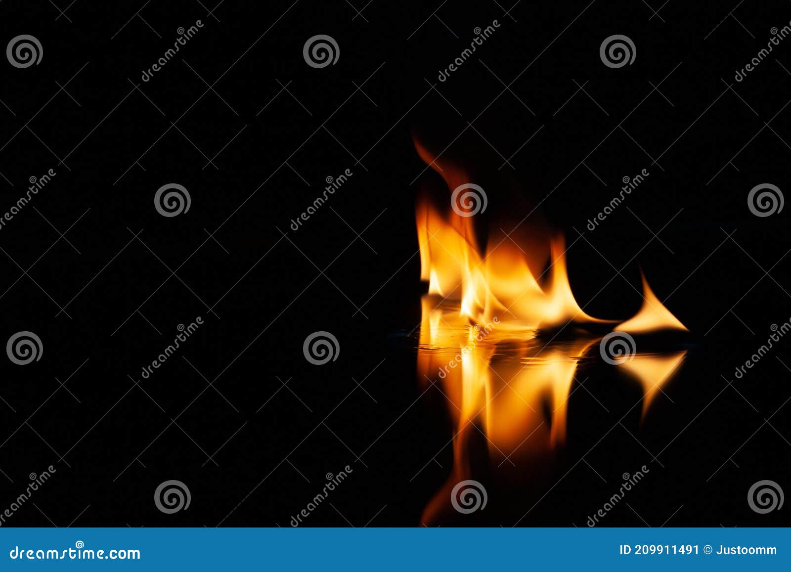 Fire Flame with Reflection in the Glass on a Black Background Stock ...