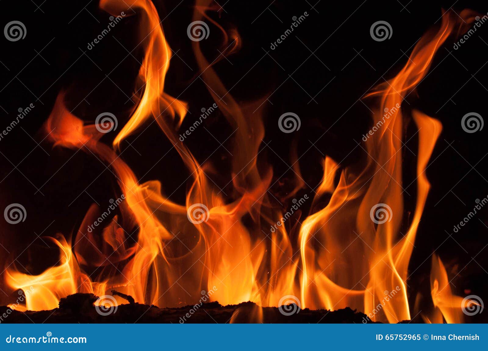 Fire Flames On A Black Background. Blaze Fire Flame Texture Background ...