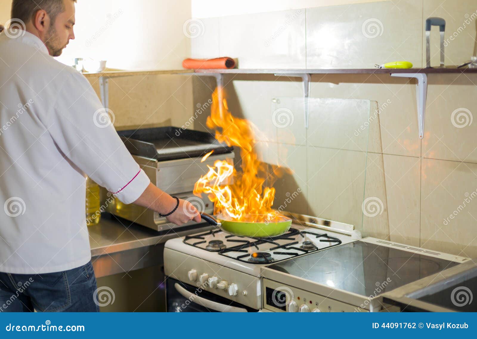 Fire in a frying pan stock photo. Image of modern, mixed - 44091762