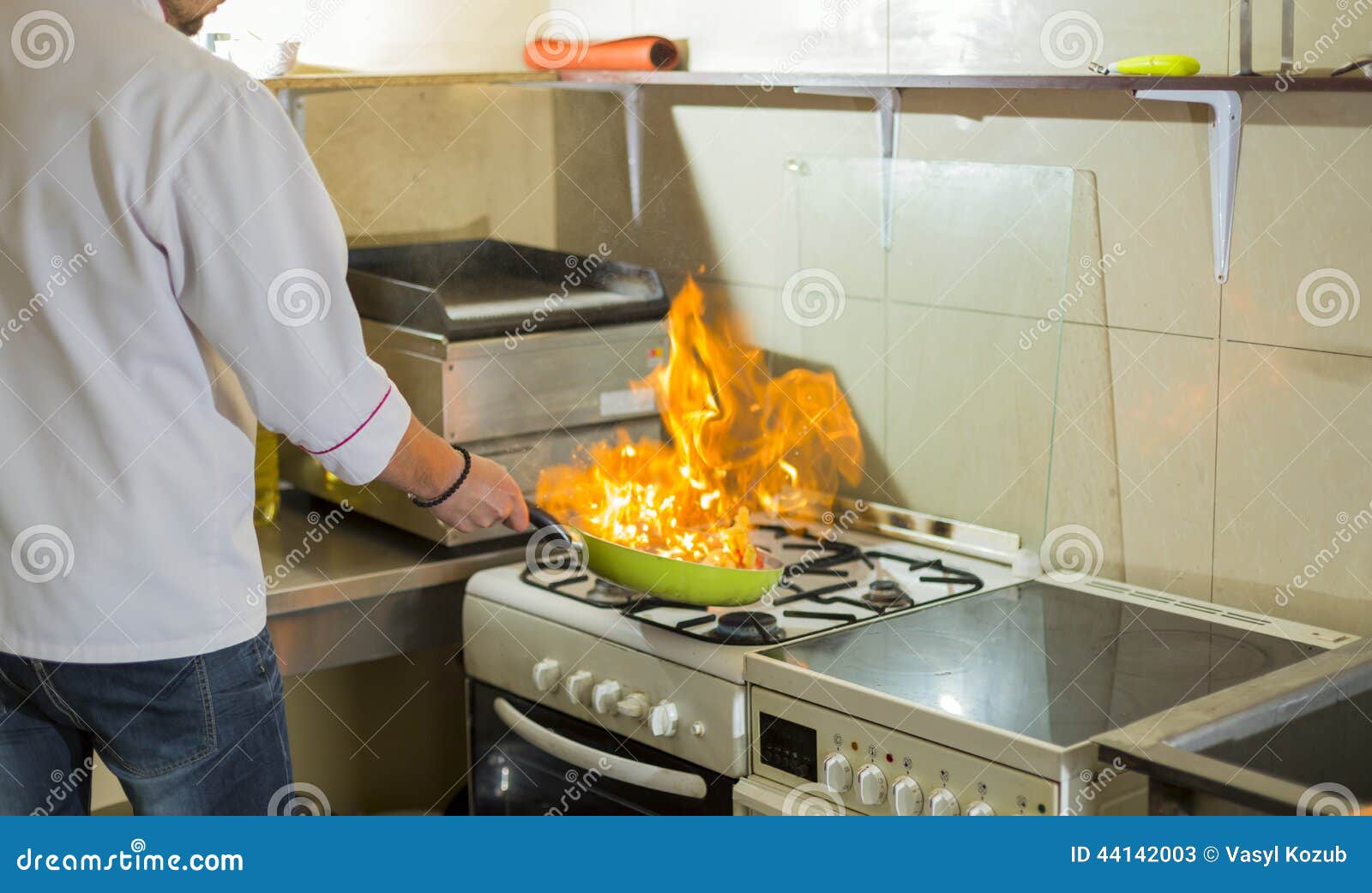 Fire in a frying pan stock image. Image of cooking, commercial - 44142003