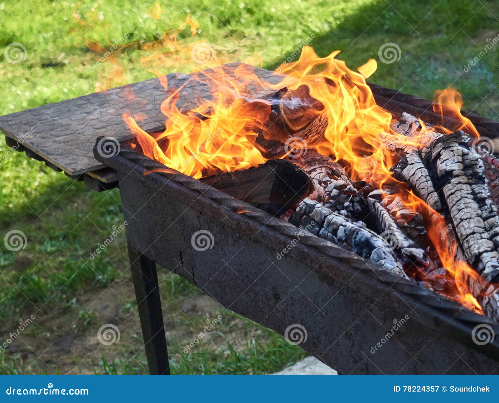 The fire in the grill stock image. Image of abstract - 78224357