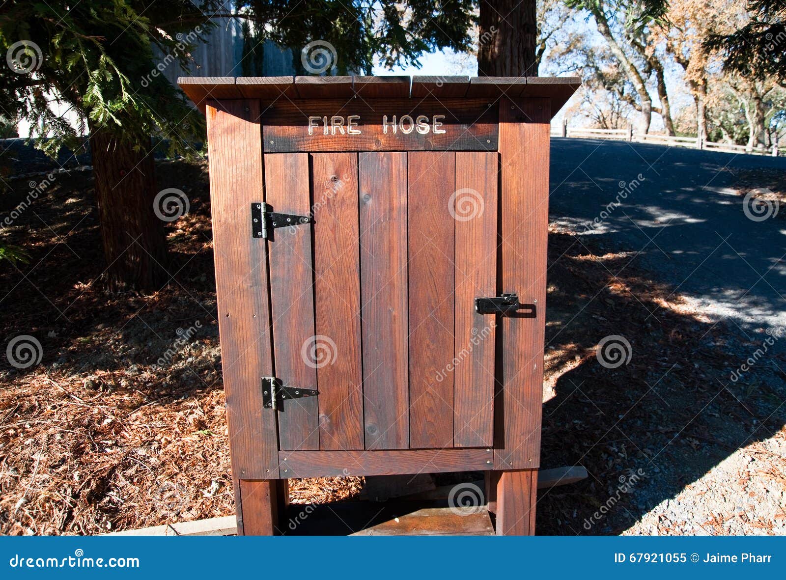 Fire hose cabinet stock image. Image of hose, wooden - 67921055