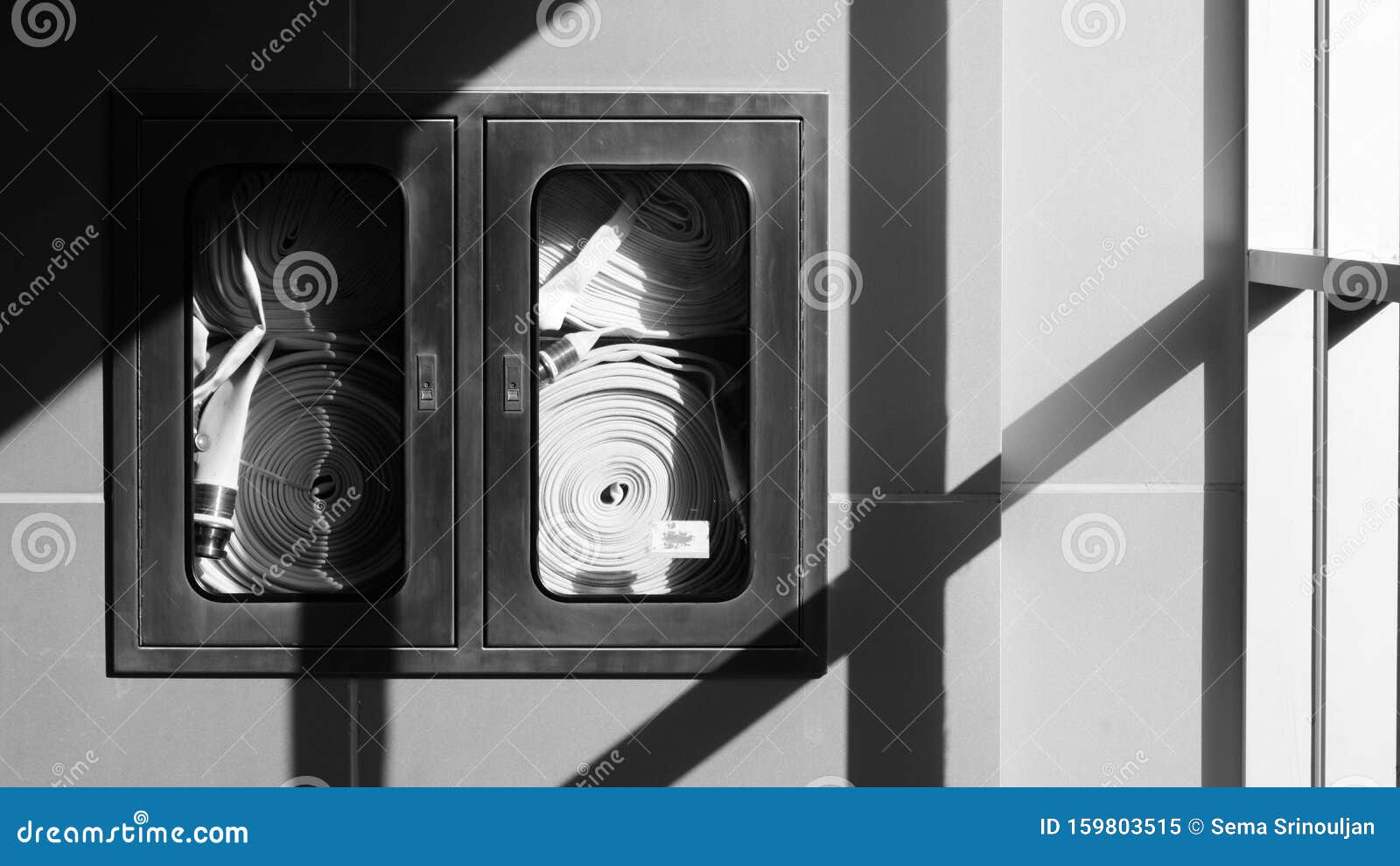 Fire Hose Hanging on the Wall. Stock Image - Image of safety, shadow ...