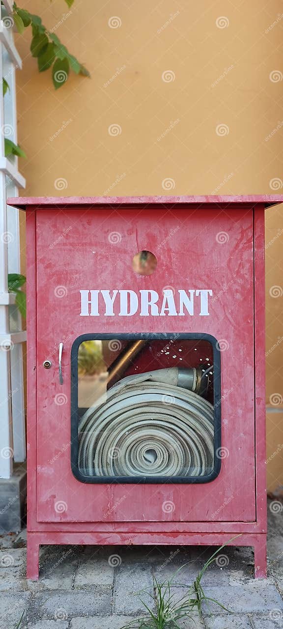 Fire Hose and Hydrant at Building Stock Image - Image of extinguisher ...