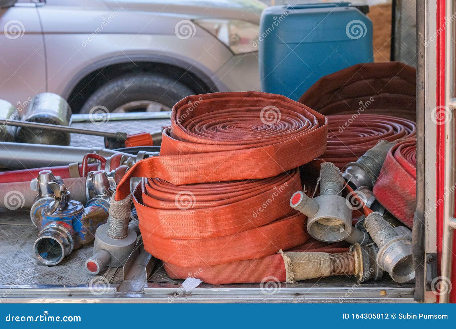 Fire Hose Rolled Up in Fire Brigade Stock Photo - Image of connection ...