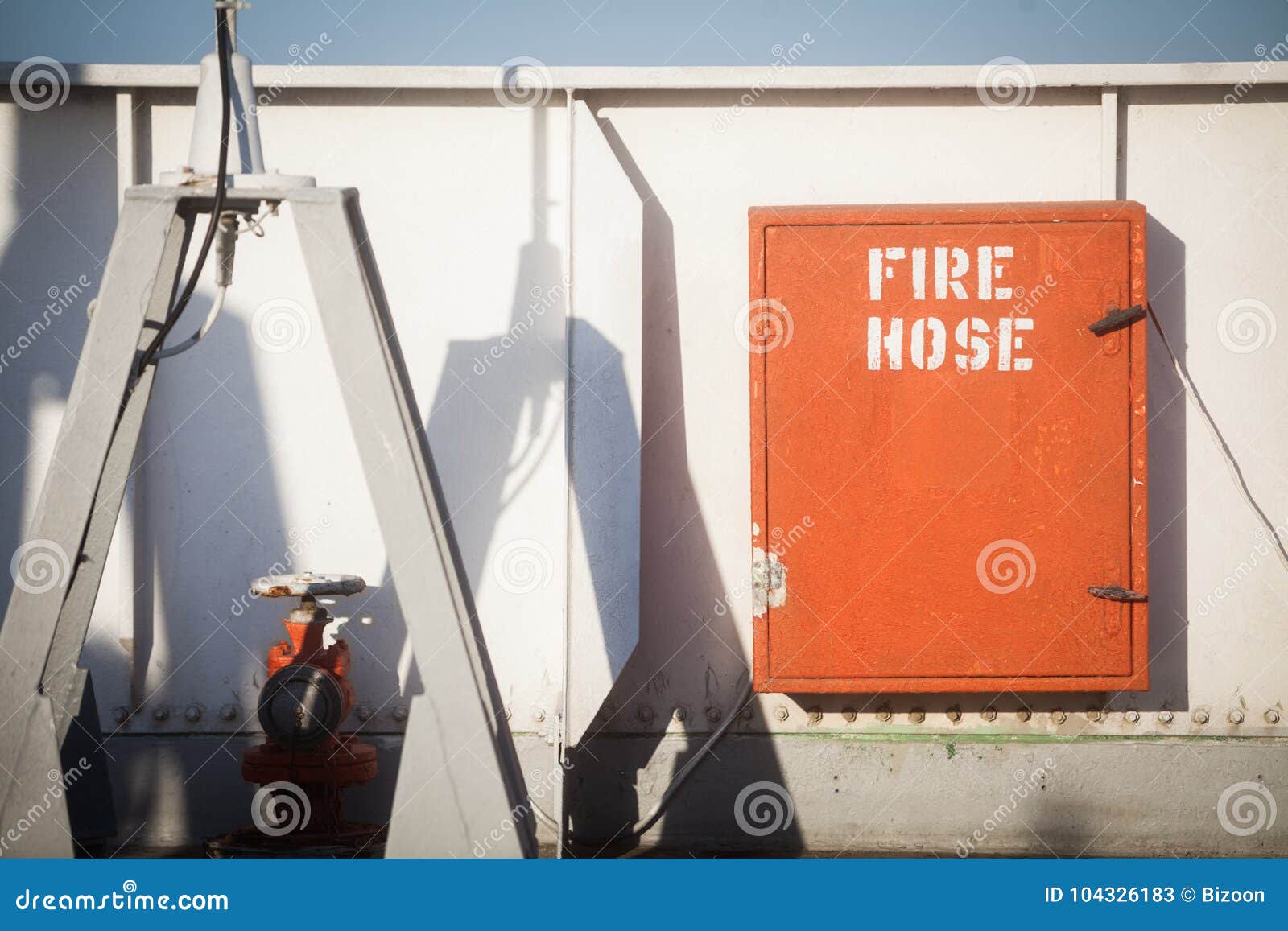 Fire hose on a ship stock image. Image of safety, reel - 104326183
