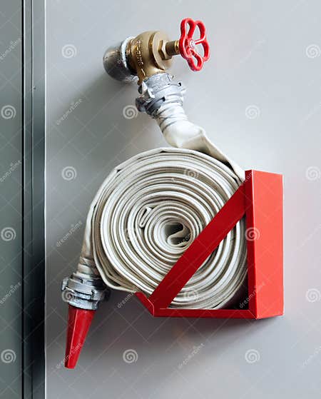 Fire-hose on the wall stock photo. Image of flame, extinguish - 20613308