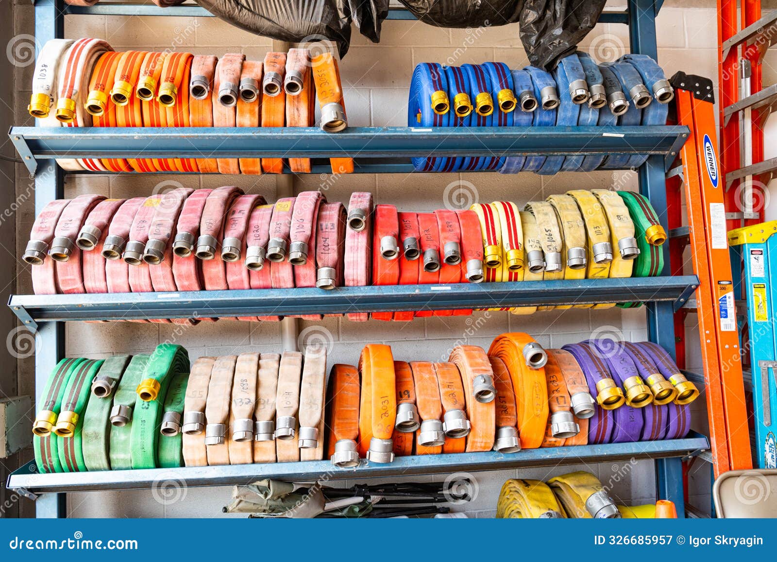 Fire Hoses in Rolls are Stacked on Racks at a Fire Station Stock Image ...