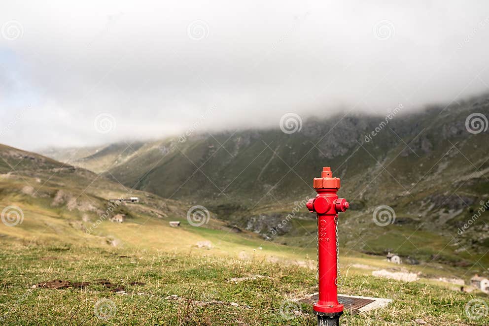 Fire Hydrant in Alpine Scene Stock Photo - Image of single, safety ...