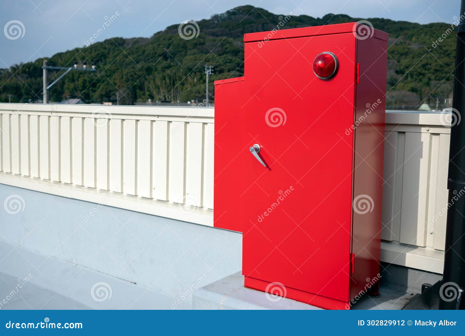 A Fire Hydrant Box is Placed on the Rooftop of a Building. Stock Photo ...