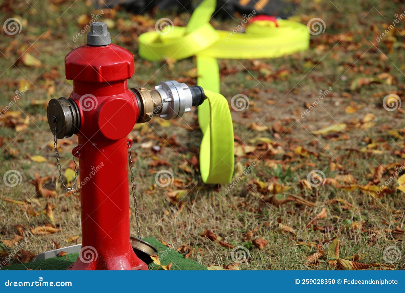 Fire Hydrant with Brightly Colored Hose during a Drill Stock Photo - Image of hazard ...