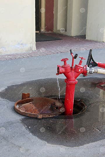 Fire Hydrant Column Mounted in the Hatch Stock Image - Image of danger ...