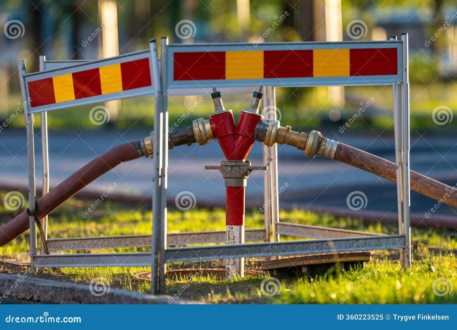 Fire Hydrant Connection with Hoses and Barriers.. Stock Image - Image ...