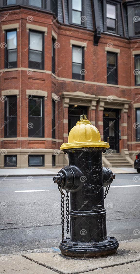 Fire Hydrant in Front of a Brick Building Stock Image - Image of safety ...