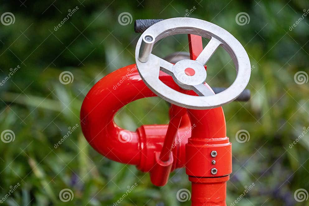 Fire hydrant in the garden stock image. Image of fire - 311386501