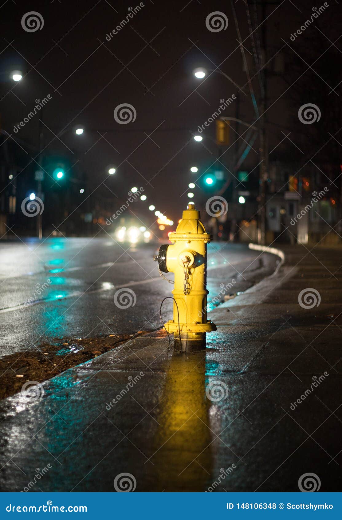A Fire Hydrant Illuminated by Car Headlights Stock Photo - Image of ...