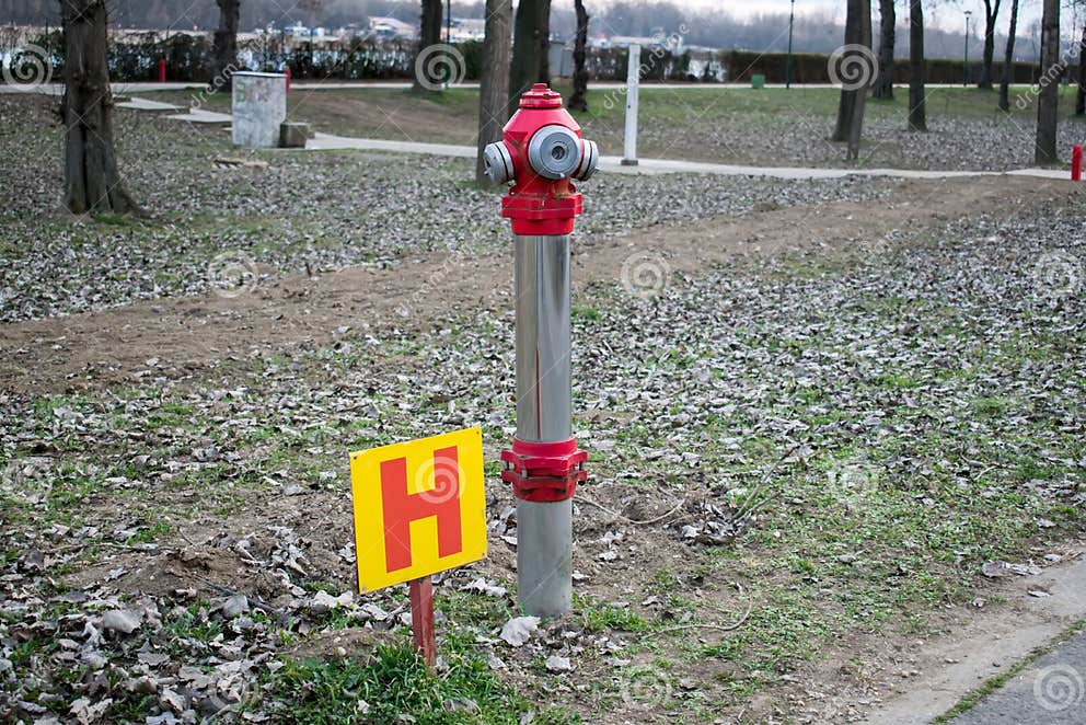 Fire Hydrant in Nature by the River Stock Image - Image of equipment ...