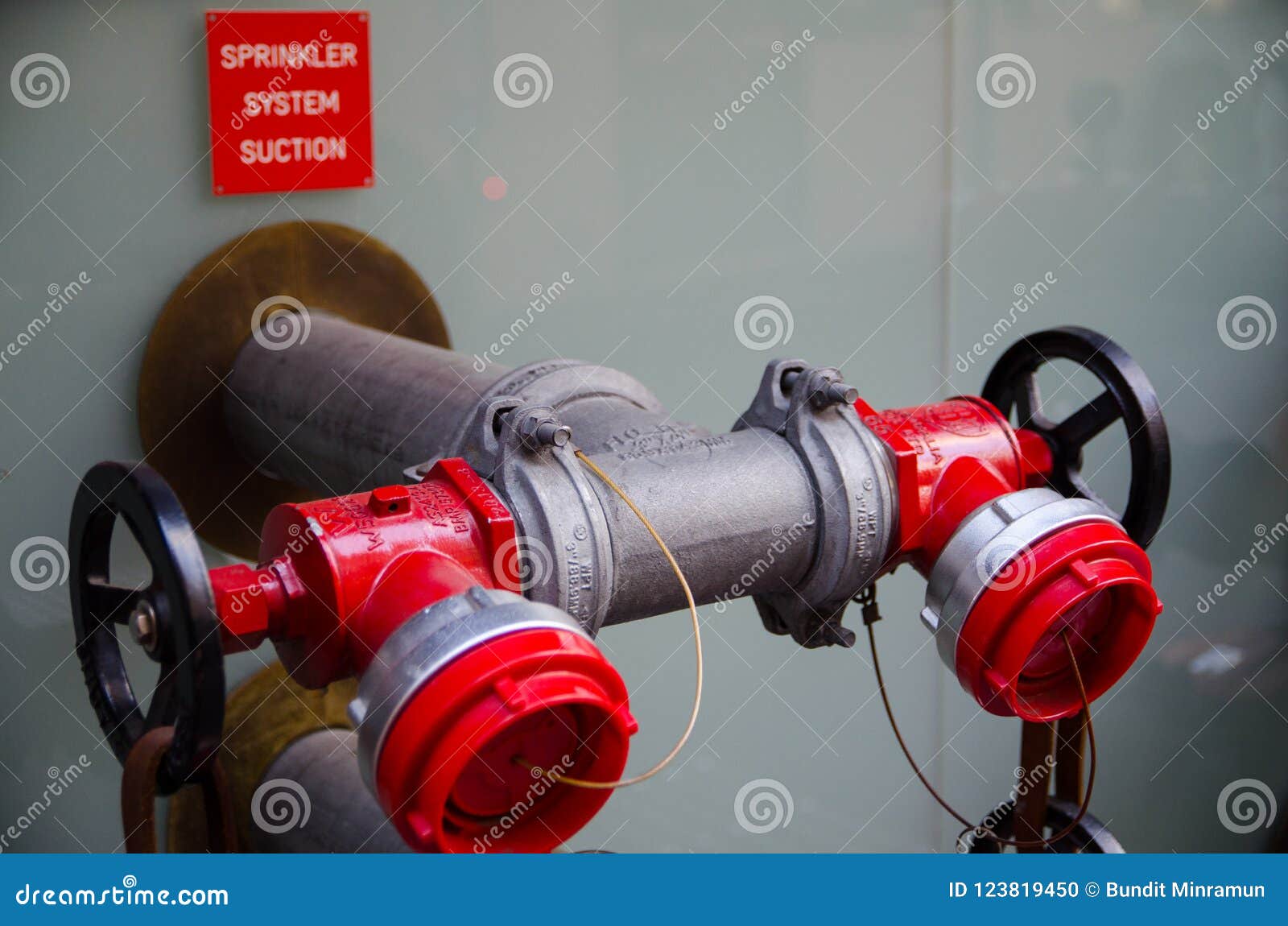 Red Firefighting Hydrant Over The Grey Wall Of Staircase. Equipment For ...