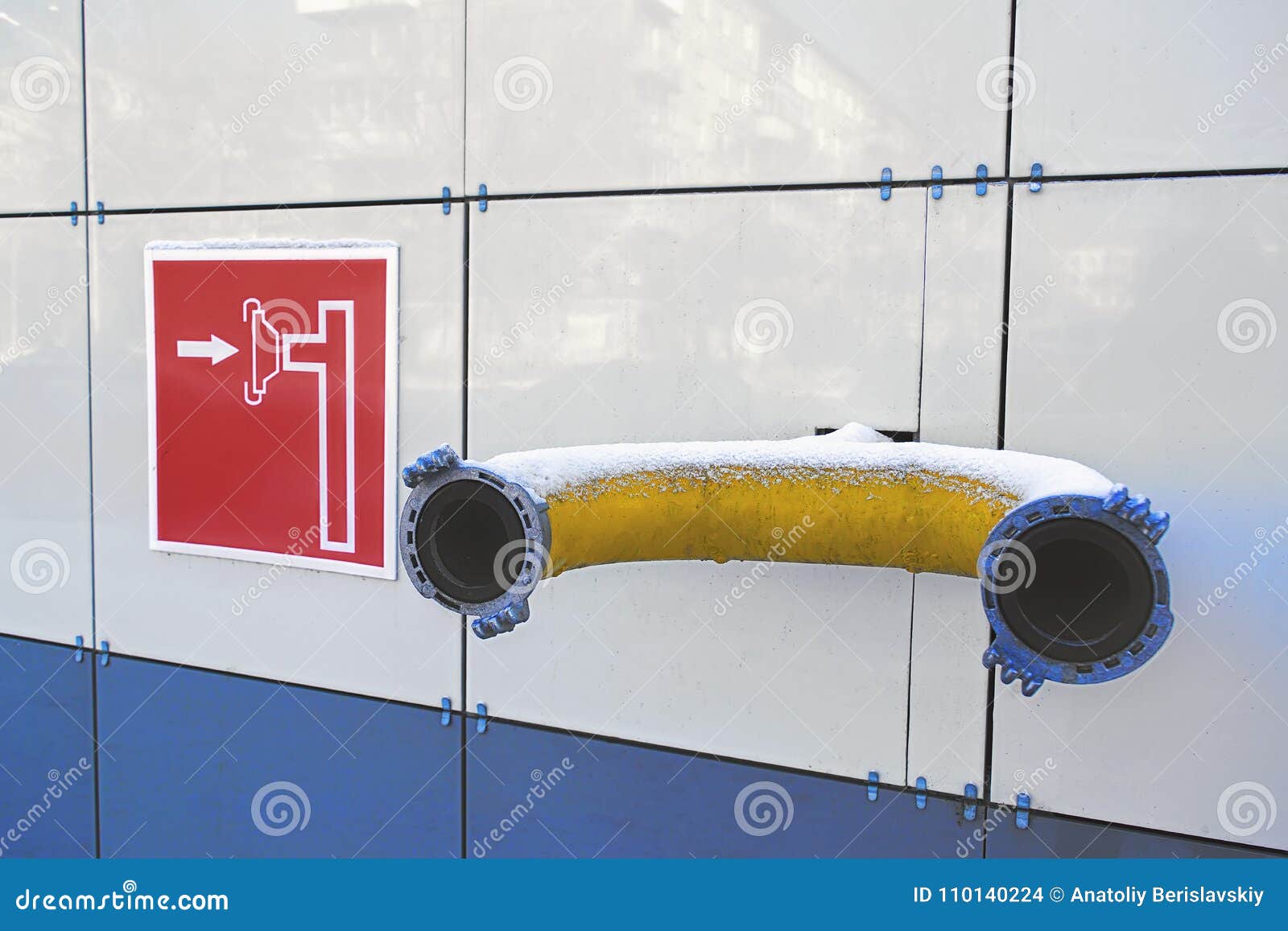 Fire hydrant on the wall stock photo. Image of color - 110140224