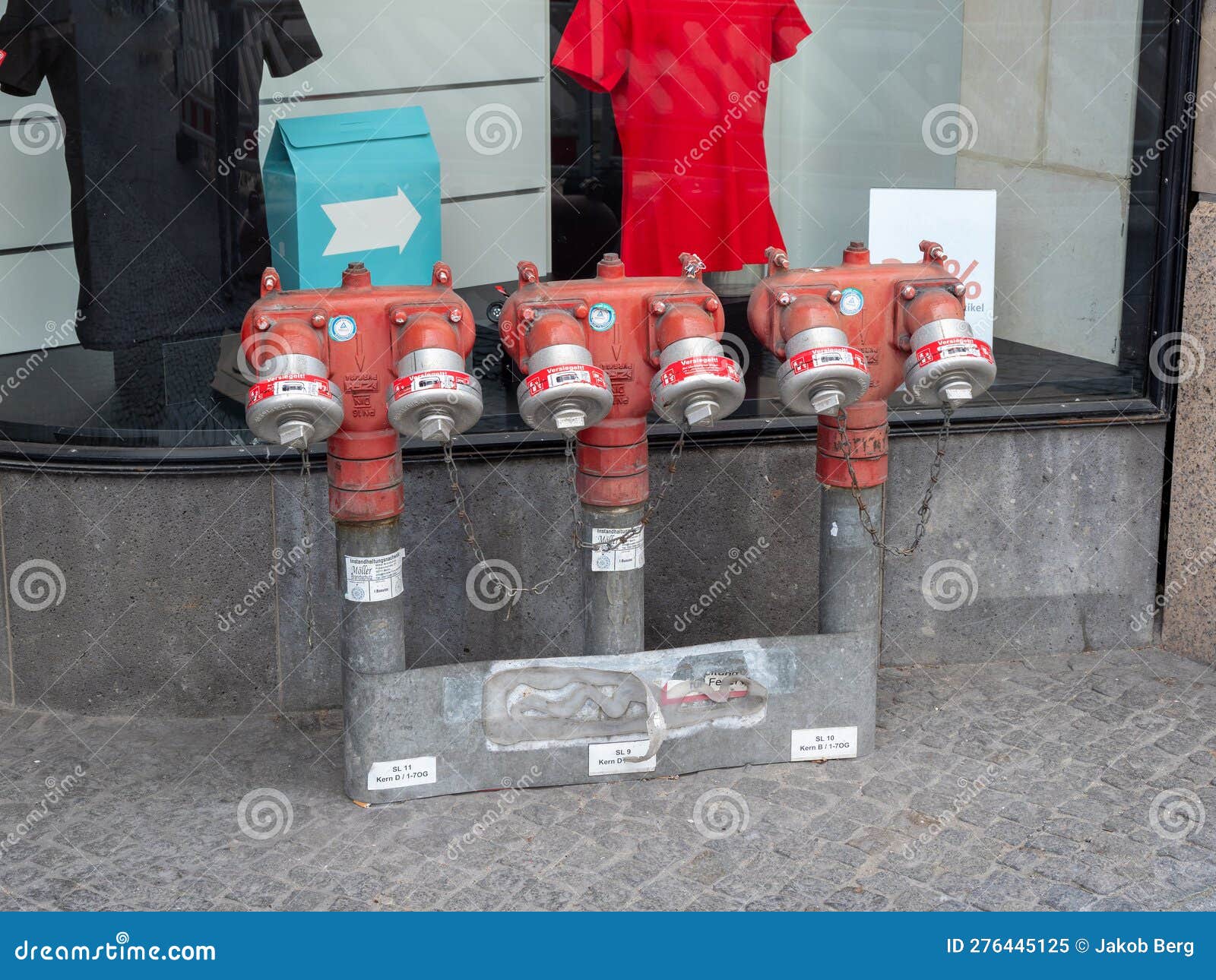 Fire Hydrant and the Walls of the Building. Stock Image - Image of ...