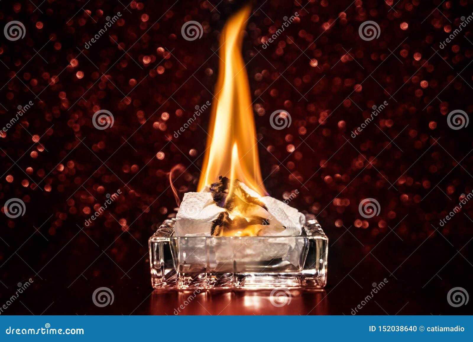 Fire Inside Square Glass Ashtray in the Dark Stock Photo - Image of ...