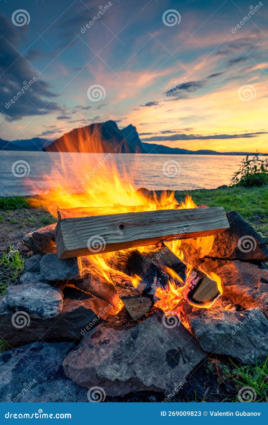 A fire on the lake during stock image. Image of space - 269009823
