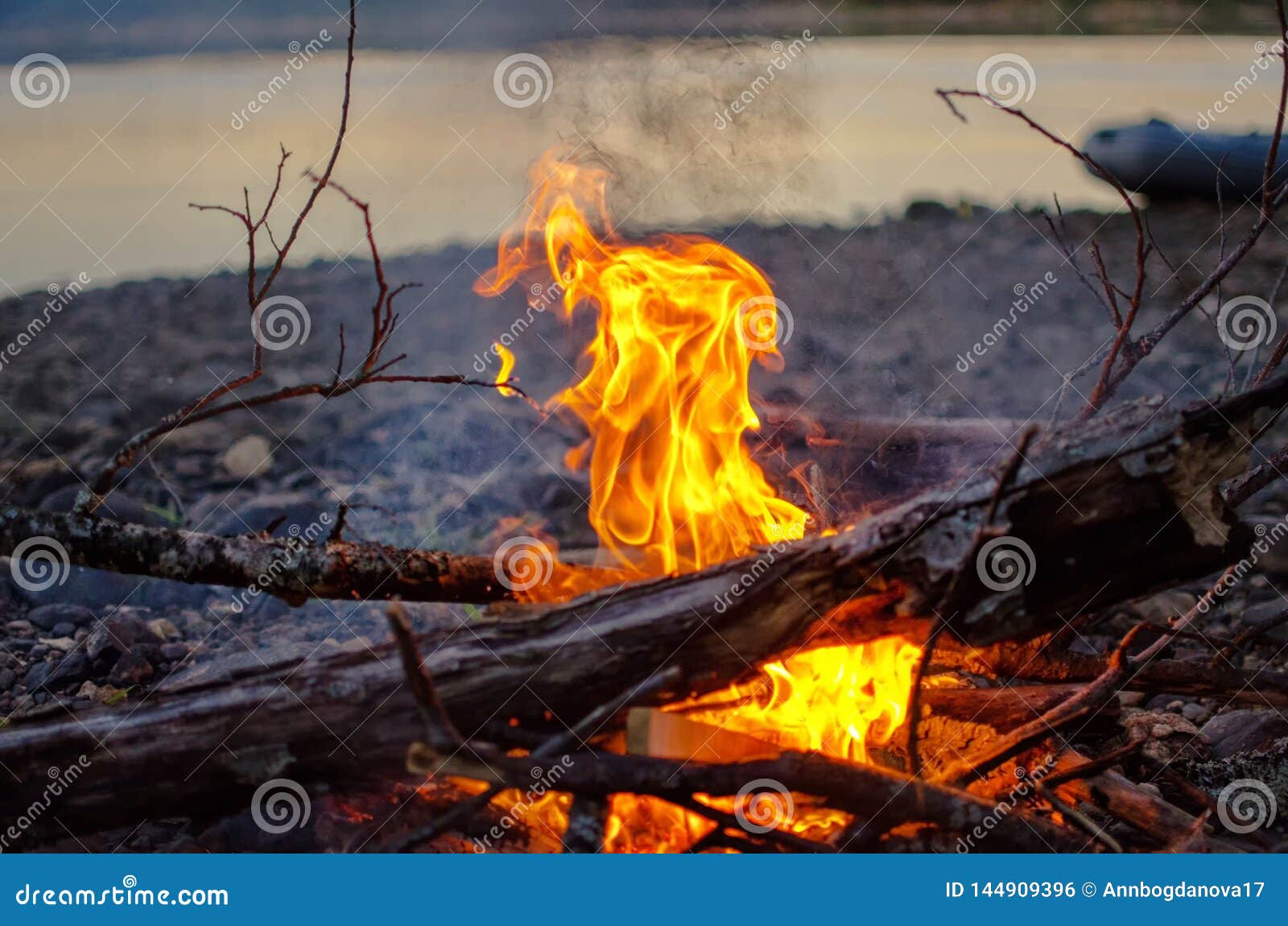 Flame of a Campfire by the River Stock Photo - Image of idea, lake ...
