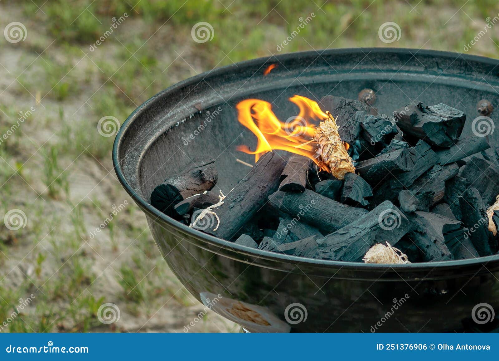 A fire lit in the barbecue stock photo. Image of bonfire - 251376906