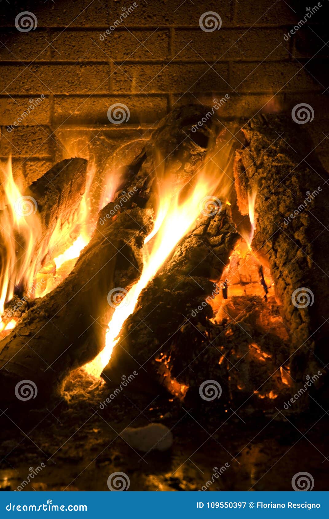 Fire lit in the fireplace stock image. Image of interior - 109550397