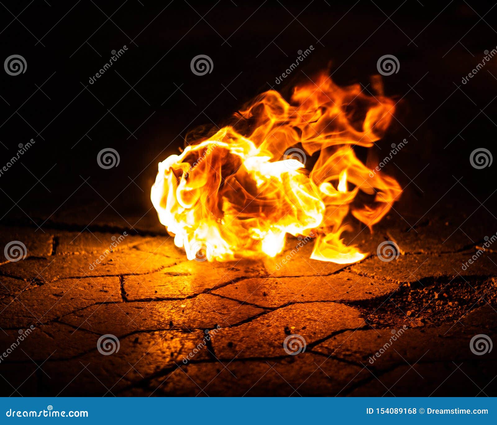 Fire lying on the ground stock photo. Image of haircut - 154089168
