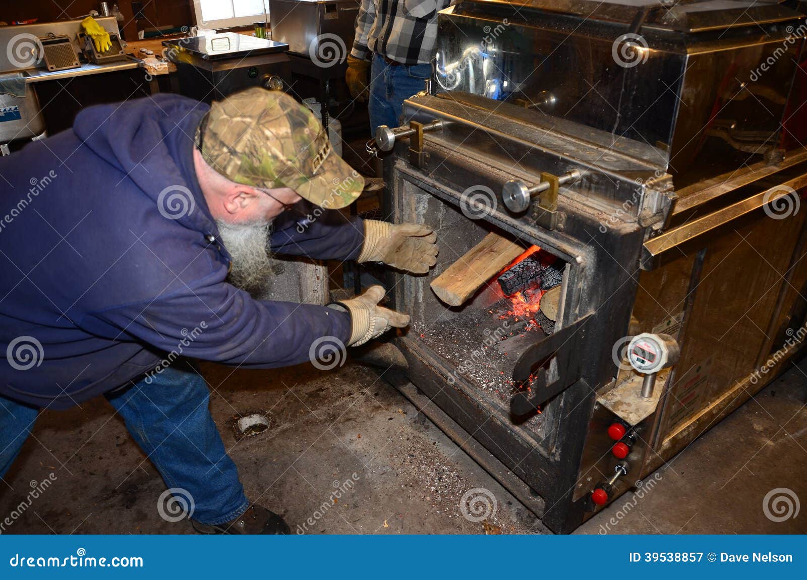 Feeding Fire for Maple Syrup Boiling Editorial Photography - Image of ...