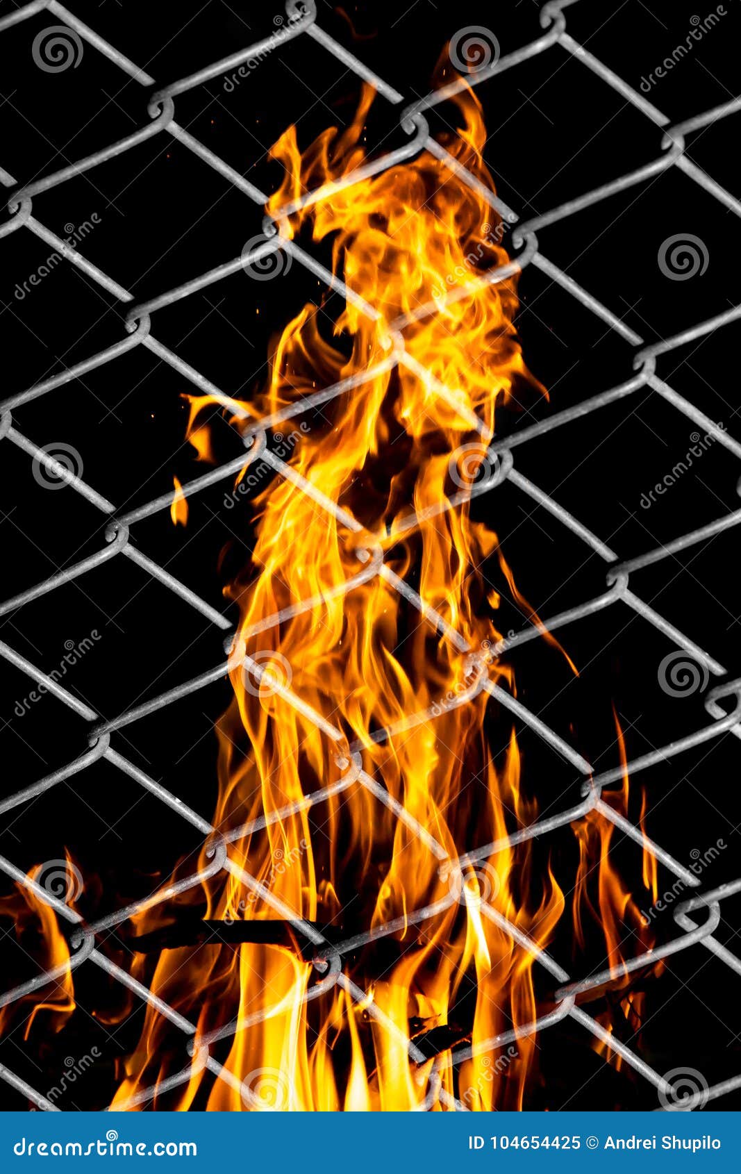 Fire in a metal grid stock image. Image of call, assistance - 104654425