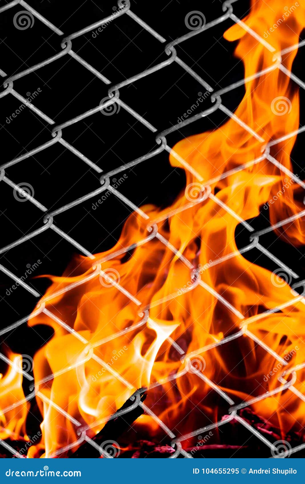 Fire in a metal grid stock image. Image of fence, glowing - 104655295
